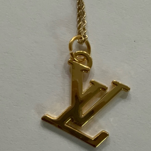 Louis Vuitton | Jewelry | Louis Vuitton Gold Logo Charm | Poshmark
